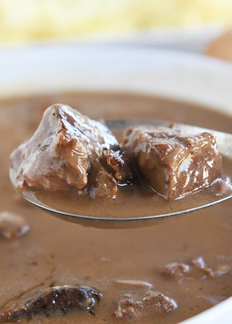 Slow Cooker Smothered Beef Tips - Mel's Kitchen Cafe